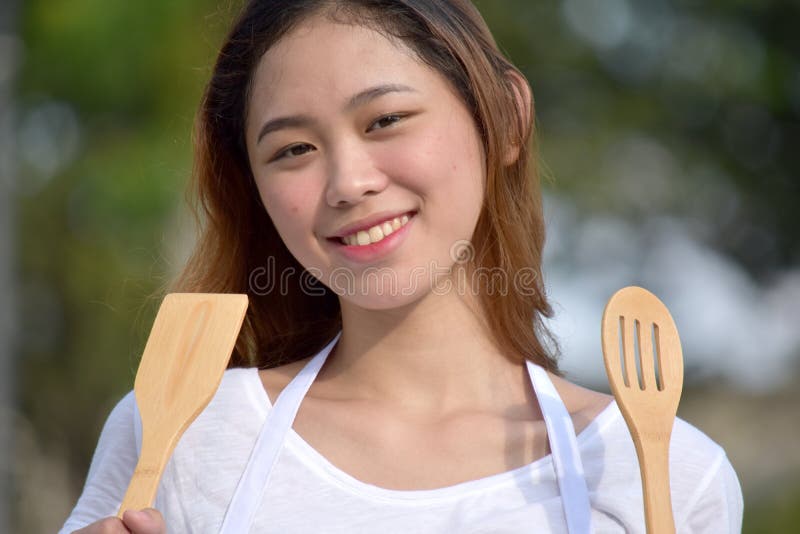 Smiling Filipina Female Cook with Utensils Stock Image - Image of ...