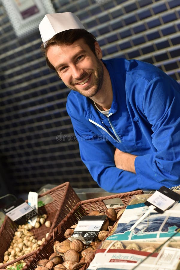 Smiling Fishmonger at Supermarket Stock Image - Image of shop, store ...