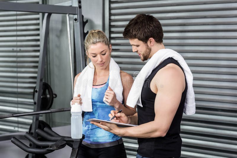 Man Woman Gym Taking Notes Stock Photos - Free & Royalty-Free Stock ...