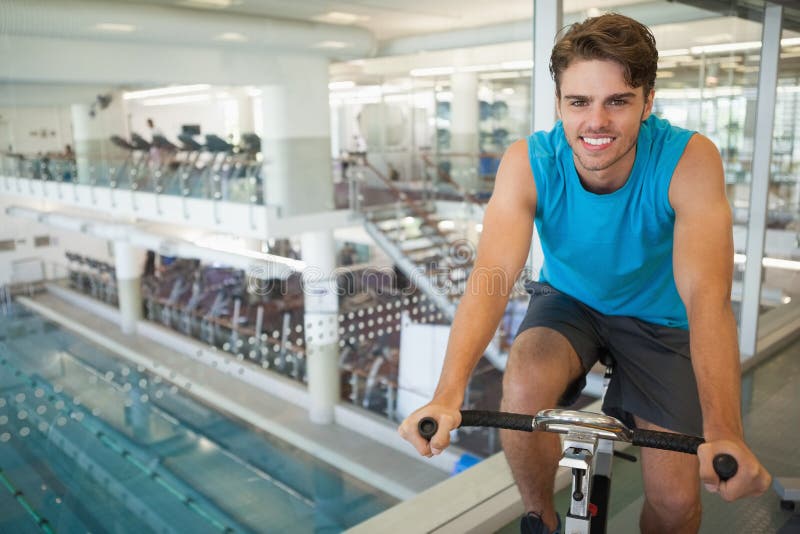 Smiling Fit Man on the Spin Bike Stock Image - Image of caucasian ...