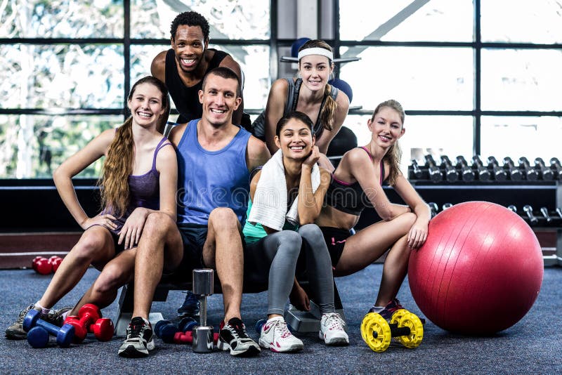 Smiling Fitness Class Posing Together Stock Photo - Image of fitness ...