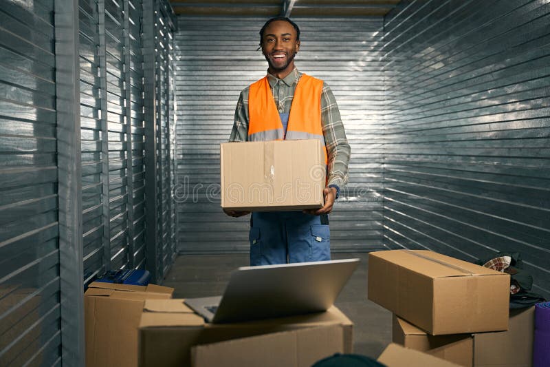 Joyous Loader Posing for Camera at Work in Storage Facility Stock Image ...