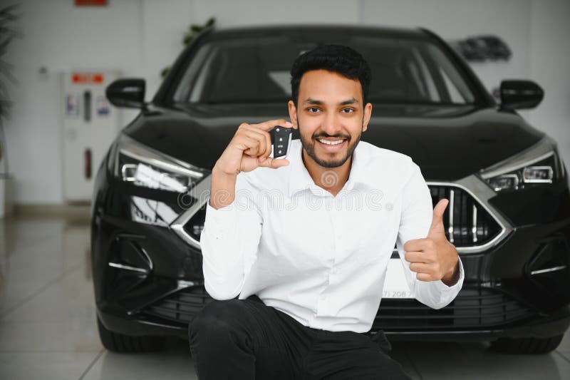 Smiling, Friendly Indian Car Seller Standing in Car Salon. Stock Image ...
