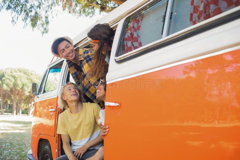 Smiling Friends in Camper Van Stock Image - Image of land, activities ...
