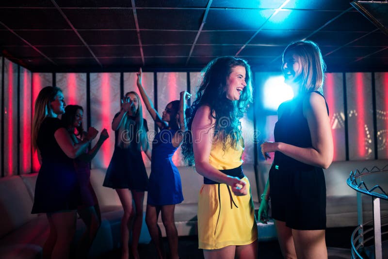 Smiling Friends Dancing on Dance Floor Stock Photo - Image of clubbing ...