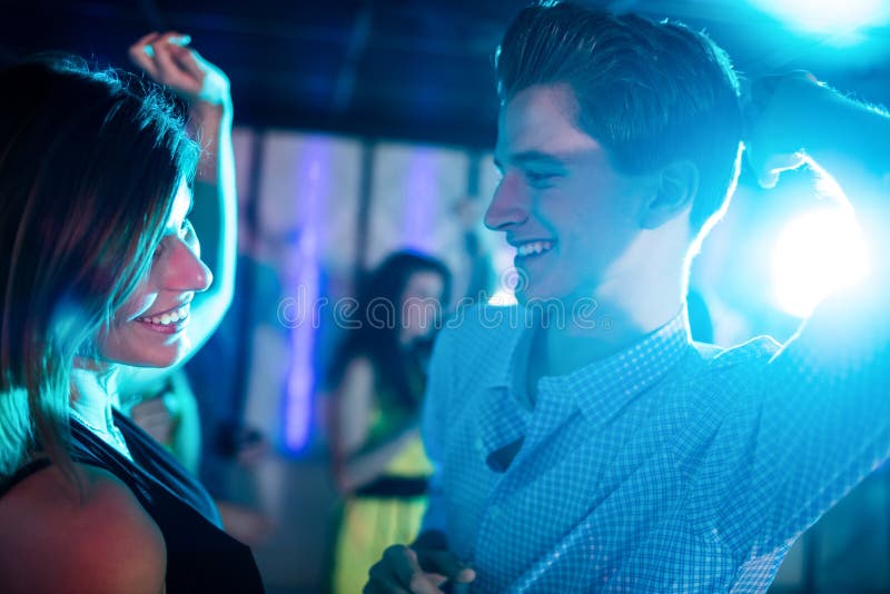 Smiling Friends Dancing on Dance Floor Stock Image - Image of dance ...