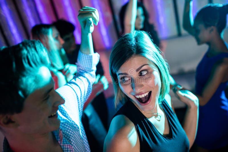 Smiling Friends Dancing on Dance Floor Stock Image - Image of lifestyle ...