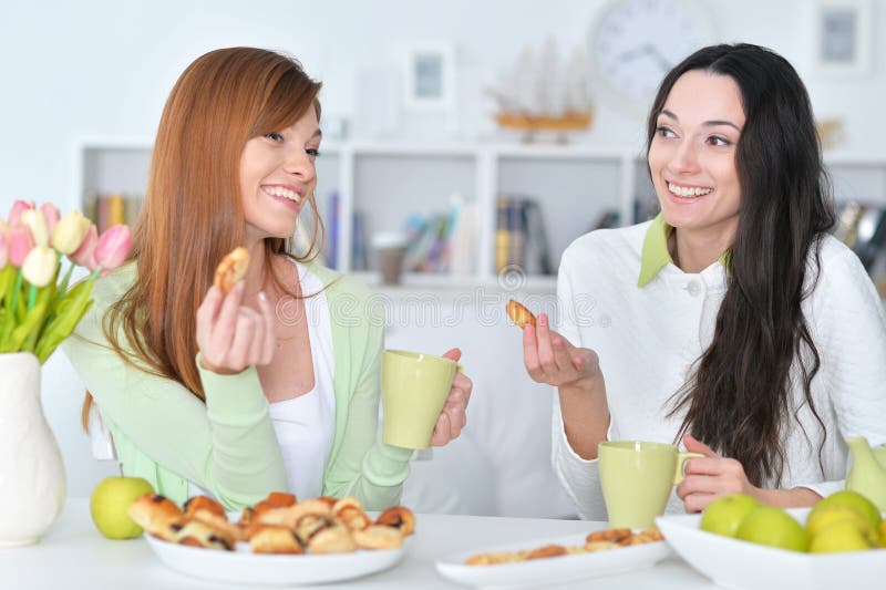 Smiling Friends Drinking Tea Stock Photo - Image of bouquet, drinking ...