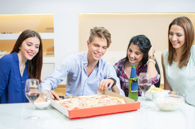 Smiling Friends Eating Pizza at Home. Stock Photo - Image of female ...