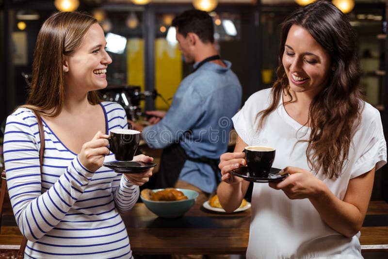 Smiling Friends Having Coffee Stock Image - Image of cafe, friendliness ...