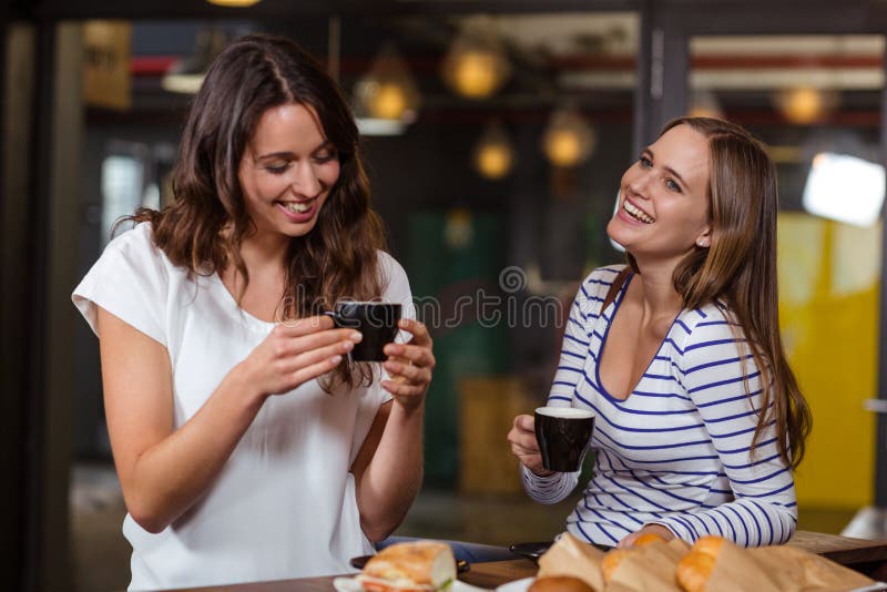 Smiling Friends Having Coffee Stock Image - Image of food, friendliness ...