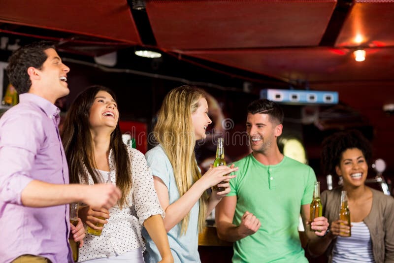 Smiling friends having fun stock image. Image of drinking - 69780333