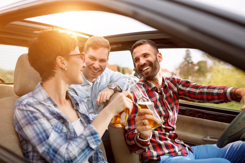 Smiling Friends Having Fun in the Car Stock Photo - Image of flare ...