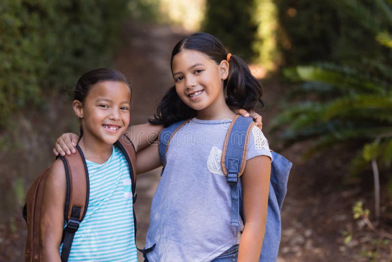 Smiling Friends Standing at Natural Parkland Stock Image - Image of ...