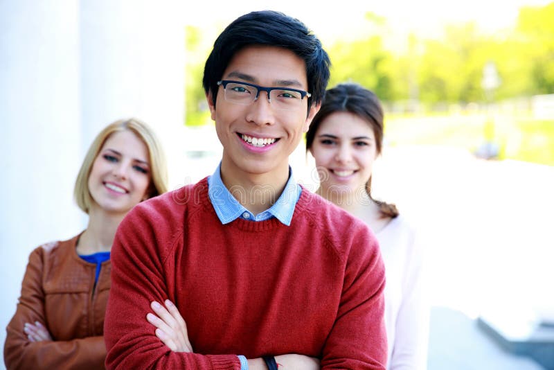 Smiling Friends Standing in Park Stock Image - Image of confidence ...
