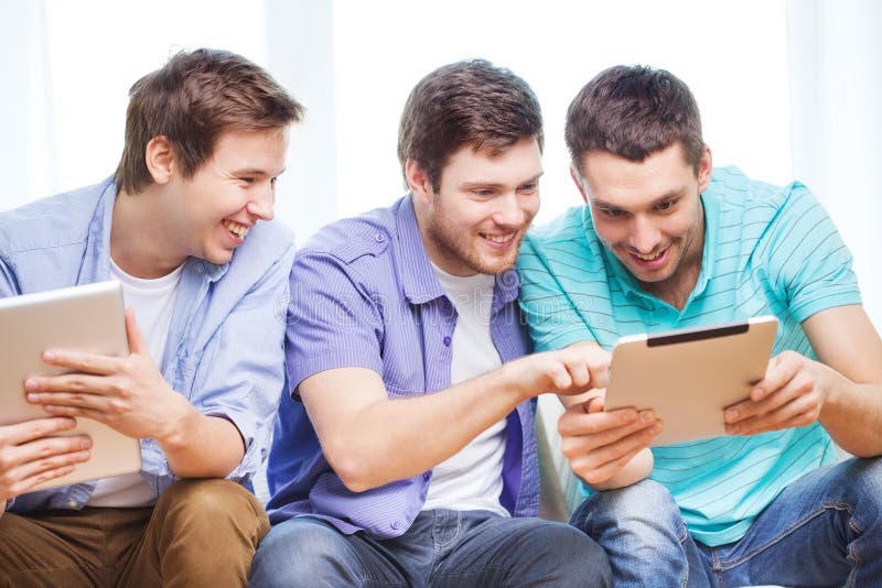 Smiling Friends with Tablet Pc Computers at Home Stock Photo - Image of ...