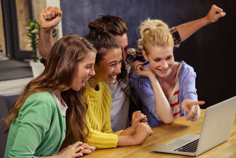 Smiling Friends Using Laptop Together Stock Image - Image of drink ...