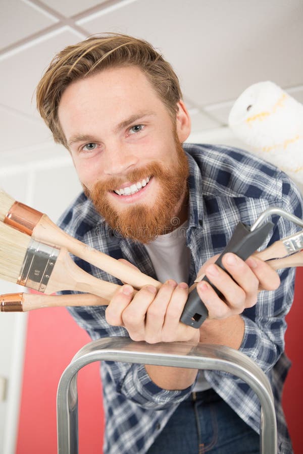 Smiling Fun Happy Man with Paint Brushes Stock Image - Image of ...