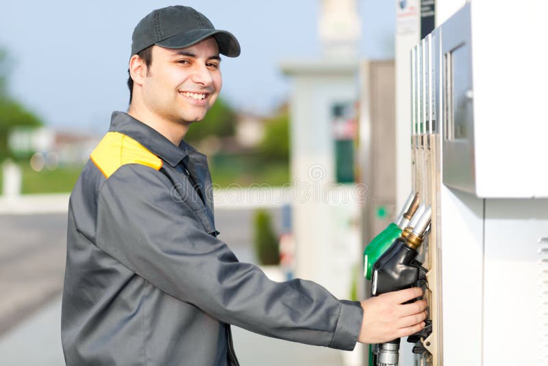 Smiling Gas Station Worker at Work Stock Image - Image of station, cost ...