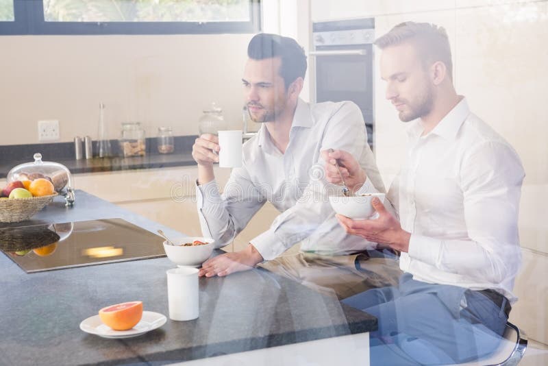 Smiling Gay Couple Having Breakfast Stock Photo - Image of cereal ...