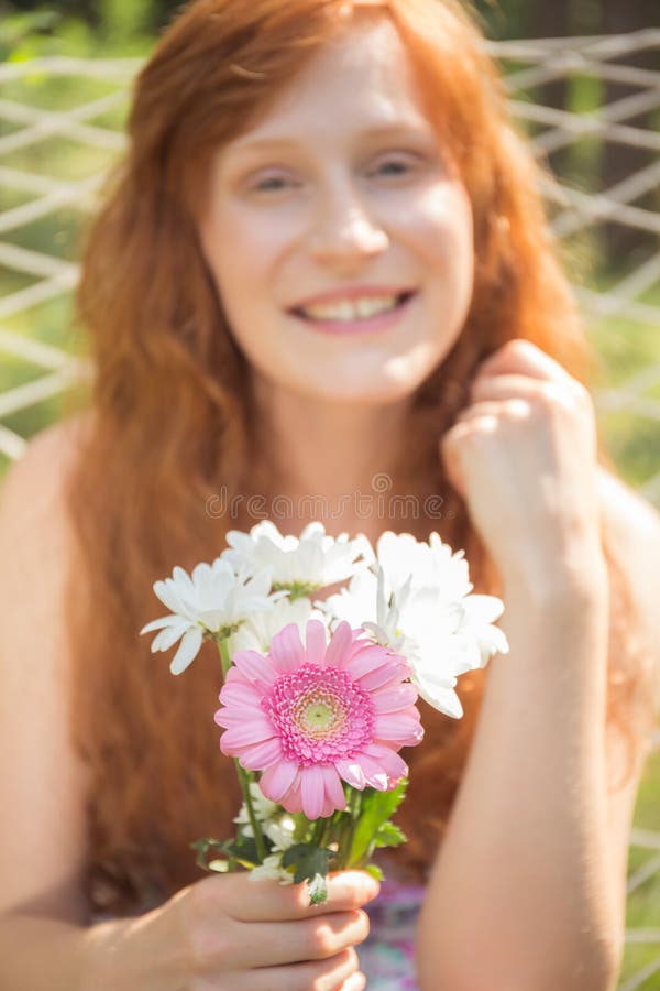 Smiling Ginger Woman with Flowers Stock Image - Image of freedom ...