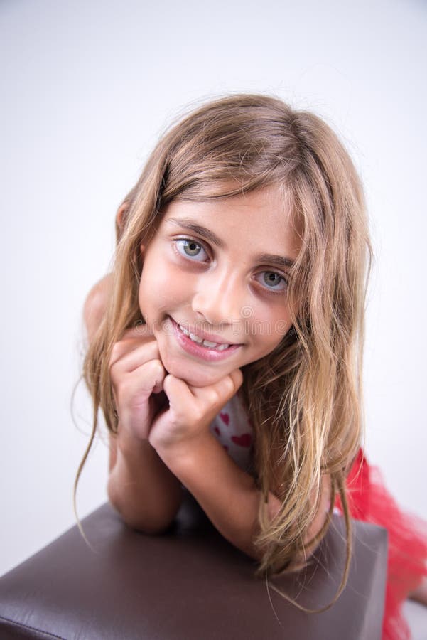 Smiling Girl in a Calm Expression Stock Image - Image of holding ...