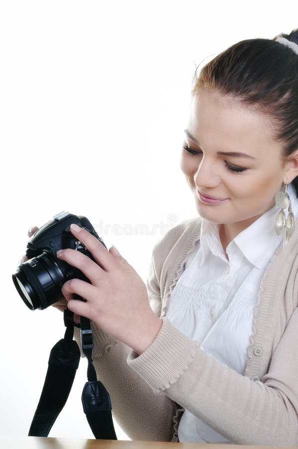 Smiling girl with a camera stock photo. Image of girl - 28308046