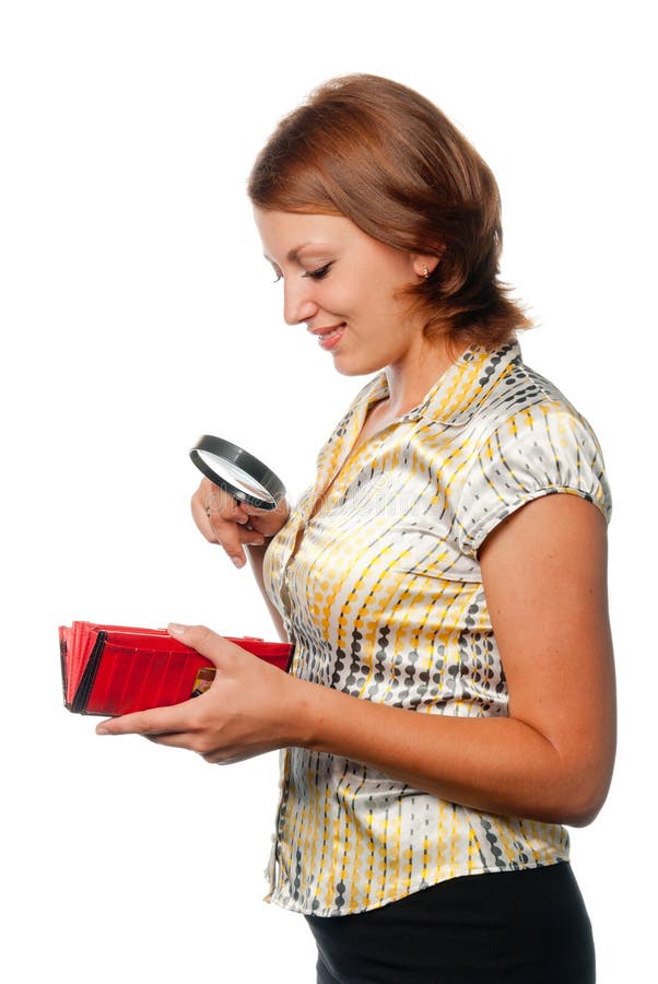 Smiling Girl Considers a Purse through a Magnifier Stock Image - Image ...