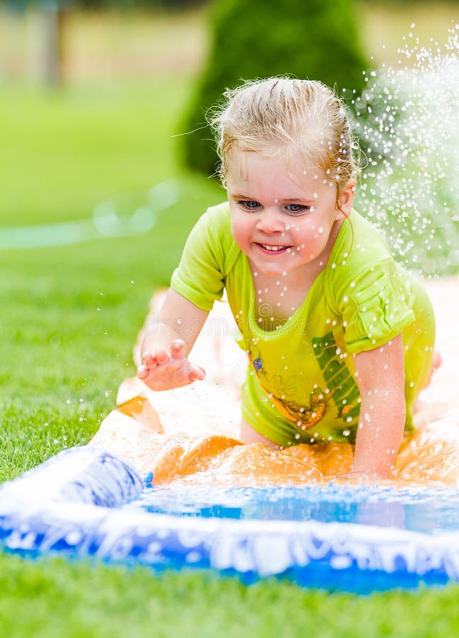 Smiling Girl Cooling Off on a Hot Summer Day Stock Image - Image of ...