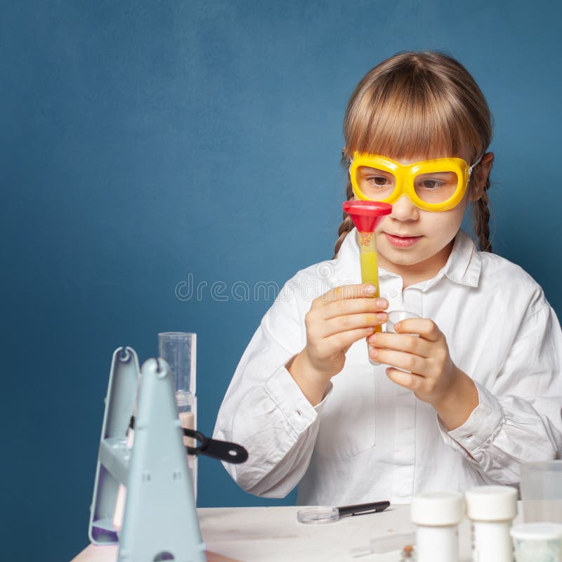 Smiling Girl Doing a Science Experiment for School Stock Image - Image ...