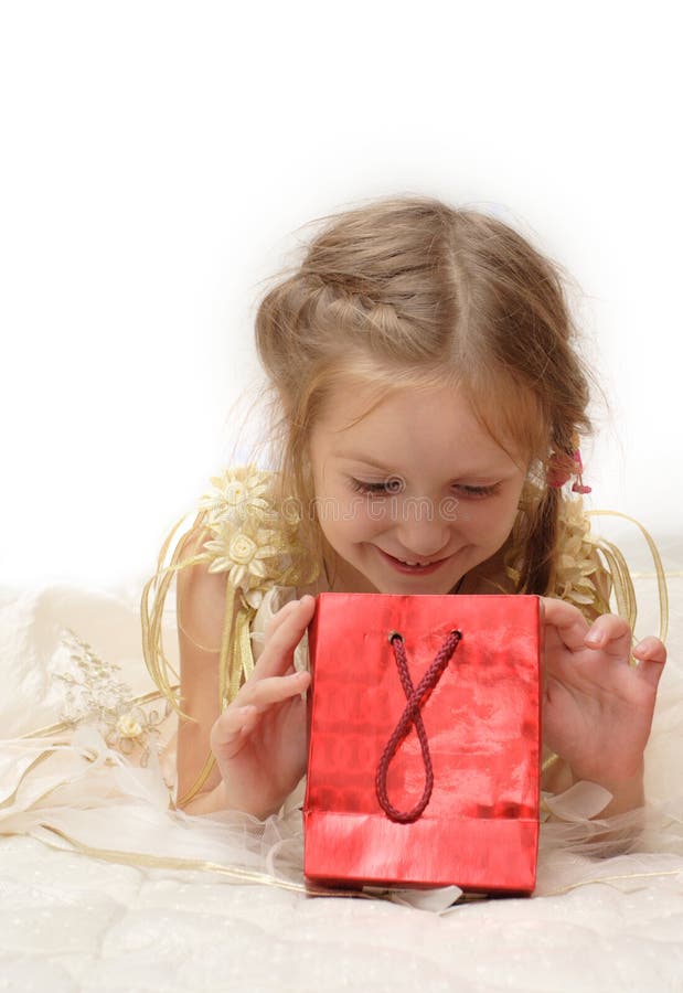 Smiling girl with gift box stock photo. Image of parcel - 7367378