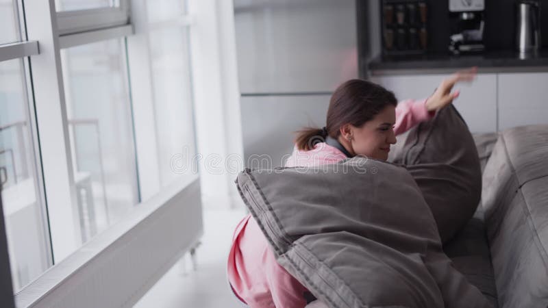 Smiling Girl Having Fun Time at Kitchen, Falling on Sofa Stock Video ...