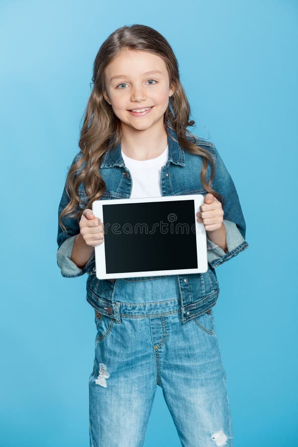 Smiling Girl Holding Digital Tablet and Looking at Camera Stock Image ...