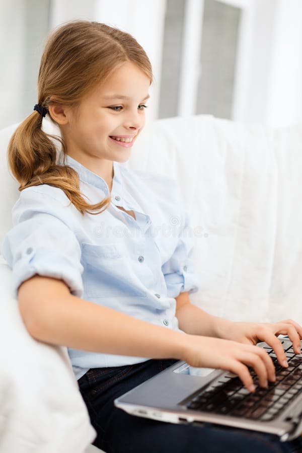 Smiling Girl with Laptop Computer at Home Stock Photo - Image of games ...