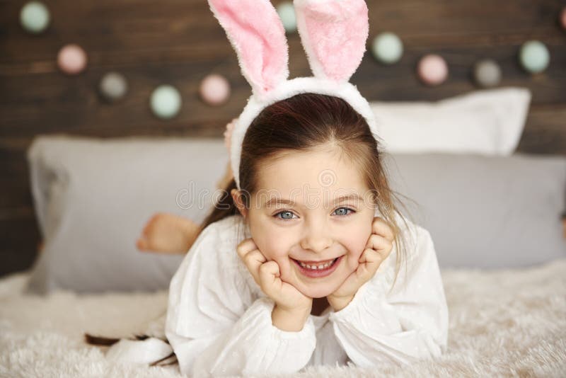 Smiling Girl Lying on the Bed Stock Image - Image of holiday ...