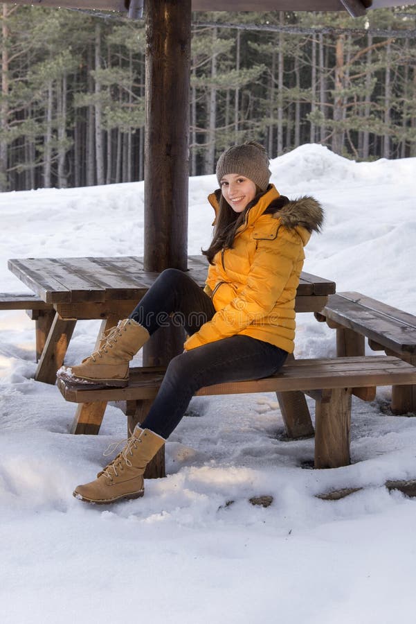 Smiling Girl Modeling in the Snow Stock Image - Image of coat, black ...