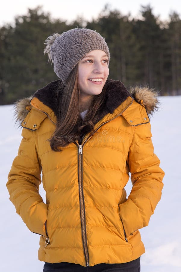 Smiling Girl Modeling in the Snow Stock Image - Image of posing, happy ...