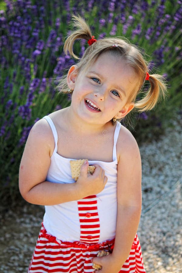 Smiling girl with plaits stock photo. Image of charming - 41818738