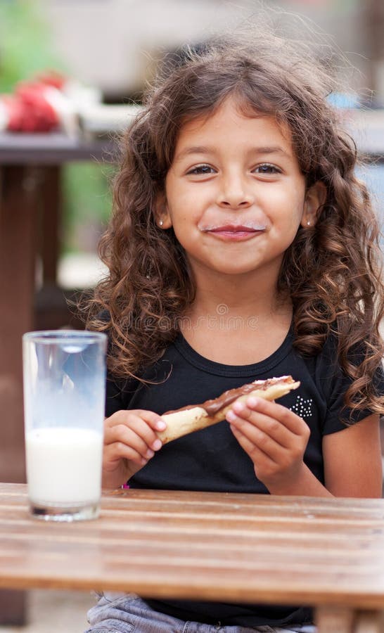 Smiling girl snacking stock image. Image of drinking - 20778057