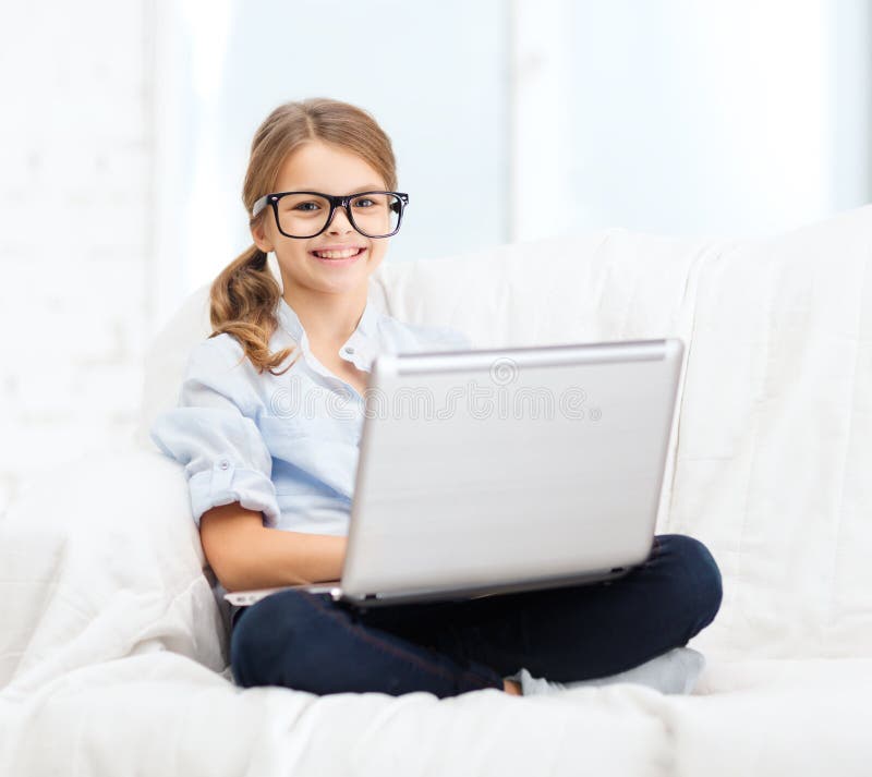 Smiling Girl in Specs with Laptop Computer at Home Stock Photo - Image ...