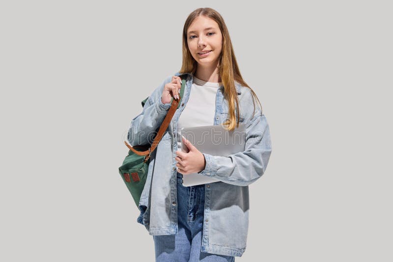 Smiling Girl Student Standing with Backpack and Laptop, Ready for ...
