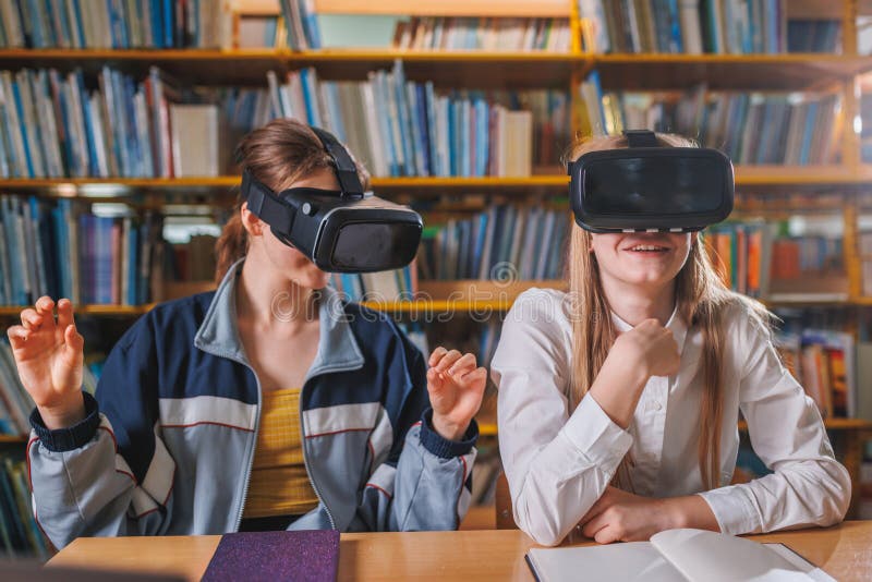 Smiling Girl Students Enjoying VR Experience in the School Library Stock Image - Image of ...