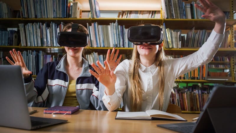 Smiling Girl Students Enjoying VR Experience in the School Library Stock Photo - Image of happy ...