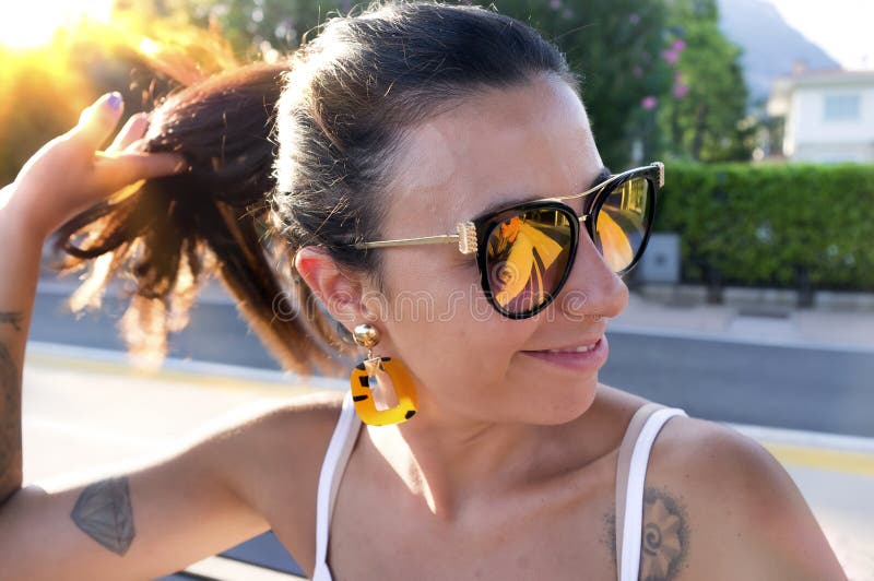 Smiling girl in the sun stock photo. Image of beach - 187560754