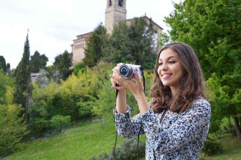 Smiling Girl Taking Photos With A Mirrorless Camera Stock Image - Image ...