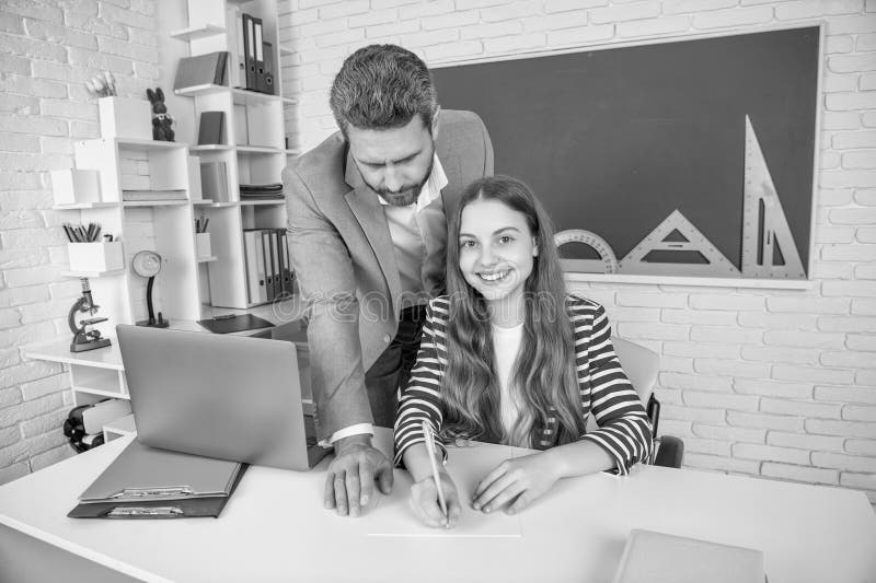 Smiling Girl With Teacher In Classroom Use Laptop Stock Image Image Of Father Computer 318592029