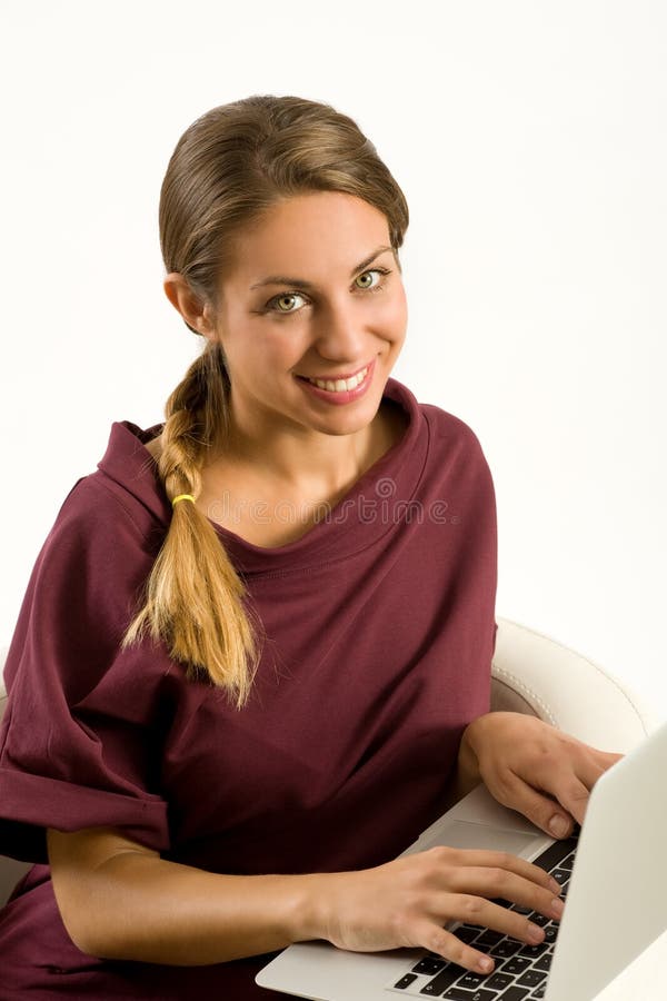 Smiling Girl in a Trendy Top Using a Laptop Stock Image - Image of ...