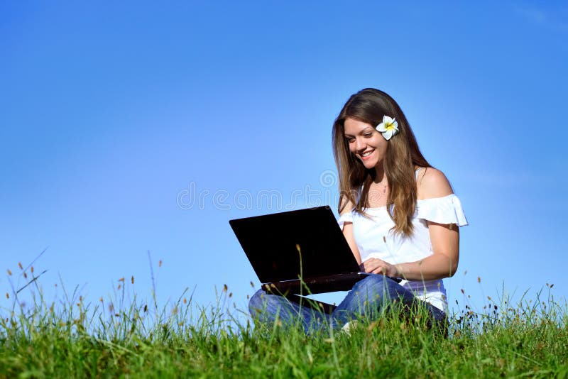 Smiling Girl Using Laptop in Nature Stock Photo - Image of internet ...