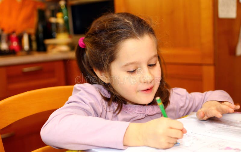 Smiling Girl Writes on Her Notebook Stock Image - Image of house ...