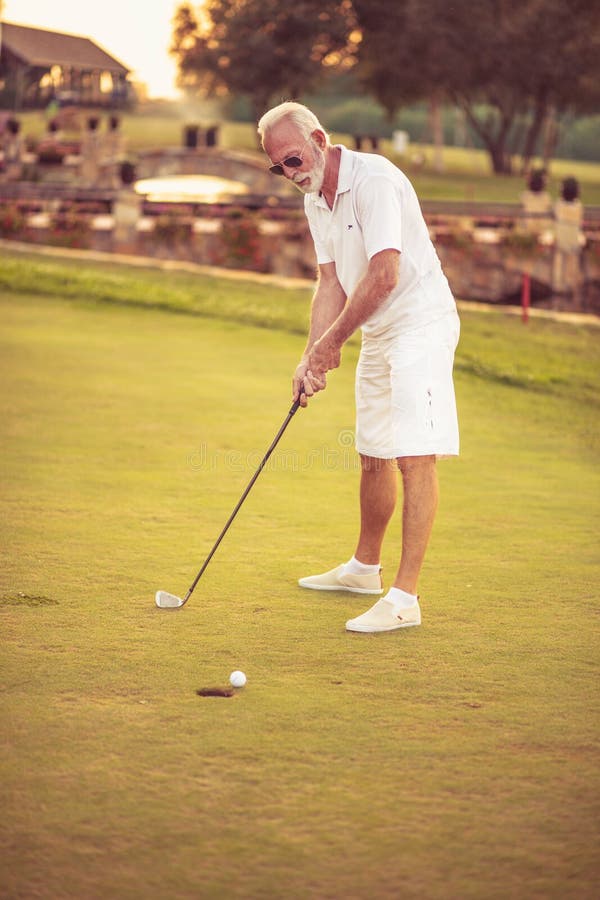 Smiling Golfer Man Playing Golf Stock Image - Image of lifestyles ...
